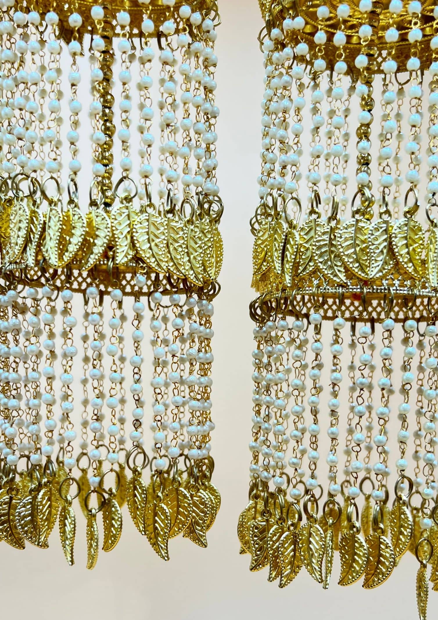 Tiered Pearl Strings Gold Tone Bridal Kalire with Leaf Tassels - GetEthnic